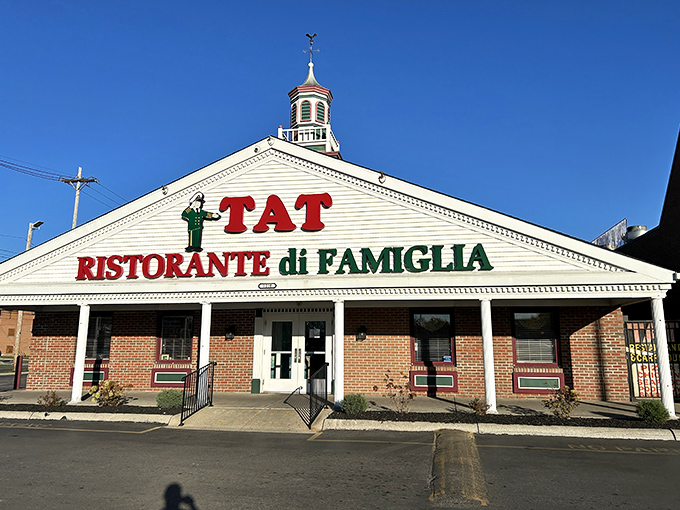 The iconic white facade of TAT Ristorante di Famiglia stands like a temple to Italian-American cuisine, complete with that charming little cupola on top.