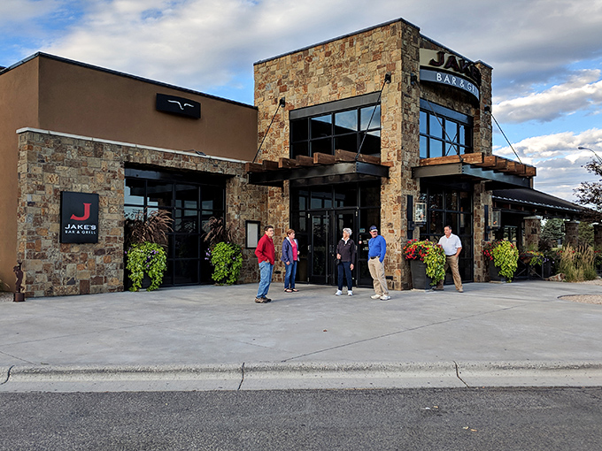Jake's impressive stone facade welcomes you like an old friend who happens to have excellent taste in architecture.