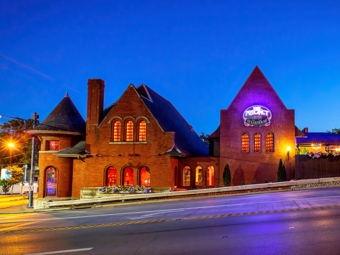 As twilight falls, The Precinct transforms into a glowing beacon of gastronomic promise. Those illuminated windows aren't just pretty&mdash;they're previews of the carnivorous paradise waiting inside.