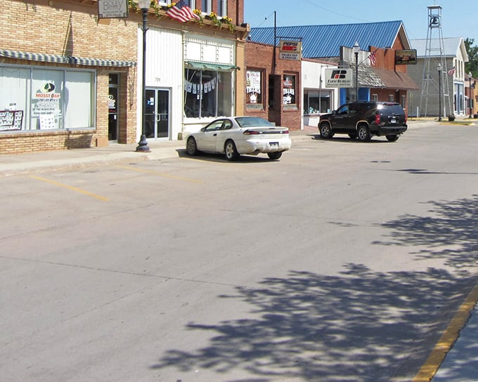 Main Street simplicity at its finest. Brick storefronts and angled parking create that "time stood still" feeling that makes small-town America both comforting and refreshingly affordable.