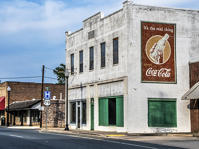 That vintage Coca-Cola mural isn't just advertising&mdash;it's a time portal to when soda fountains were social media headquarters.
