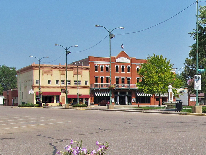 Brick buildings with character line Minden's downtown, where black-and-white awnings provide shade for window shoppers and the American flag stands proudly overhead.