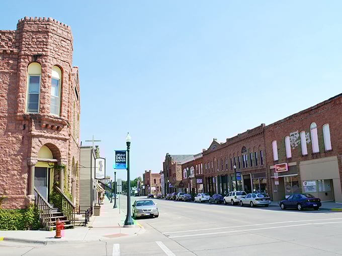 The pink quartzite castle-like building stands as Dell Rapids' signature landmark, a Victorian-era beauty that seems plucked from a European fairytale.