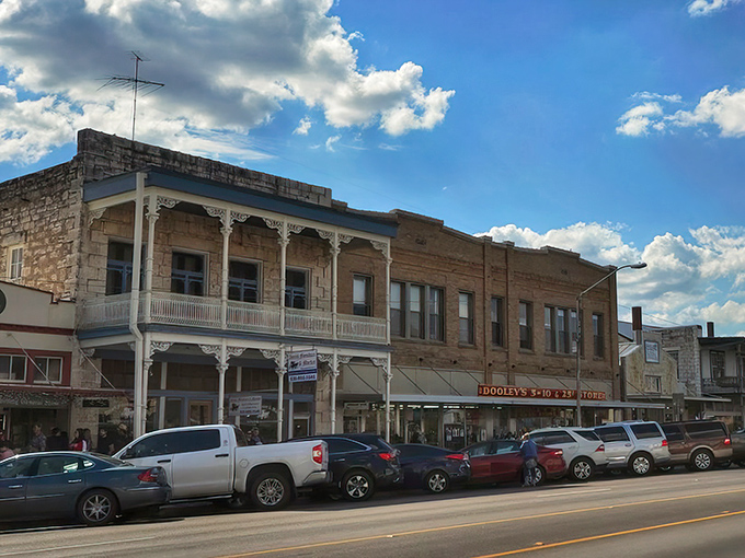 Historic limestone buildings line Main Street, where German heritage meets Texas charm in perfect harmony.