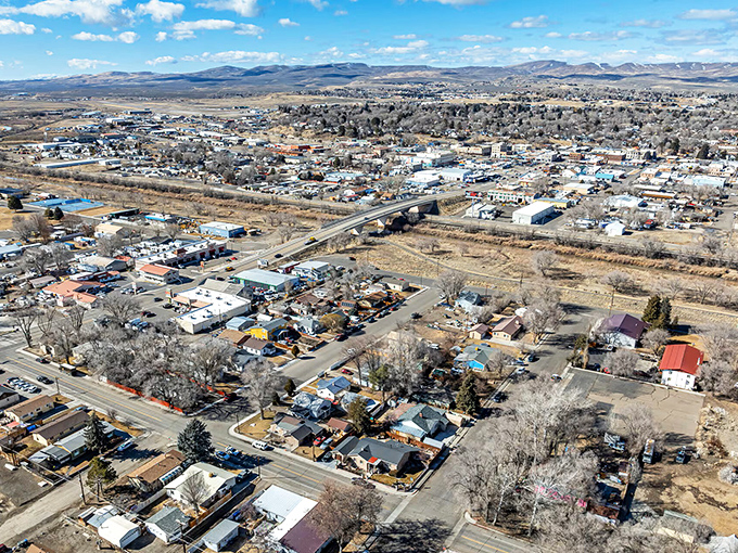 Elko sprawls beneath big Nevada skies, a patchwork of small-town charm nestled against mountains that seem to whisper, "Slow down, you're home now."