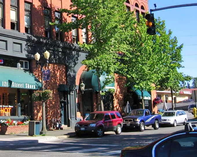 Historic brick buildings line downtown Bellingham's streets, where small businesses thrive and parking spots are actually findable. A Pacific Northwest miracle!