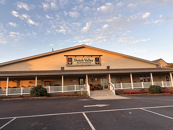 The welcoming facade of Dutch Valley Restaurant stands like a beacon of comfort food promise in Sugarcreek's rolling countryside.