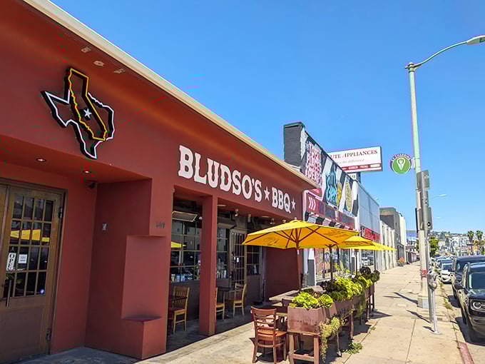 That Texas-shaped sign isn't just decoration—it's a warning that serious, no-nonsense barbecue territory lies ahead. Consider yourself deliciously warned.