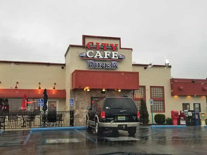 The classic diner facade beckons like an old friend, promising comfort food salvation regardless of weather. Rain or shine, hunger stops here.