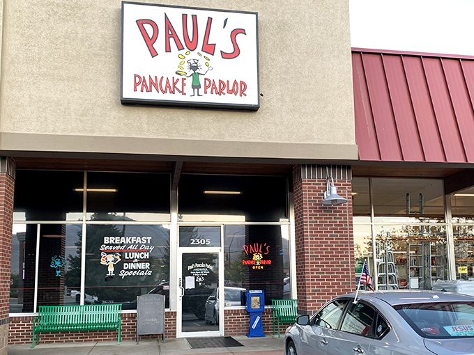 The unassuming storefront of Paul's Pancake Parlor stands like a beacon of breakfast hope on Brooks Street, promising pancake perfection within those brick walls.