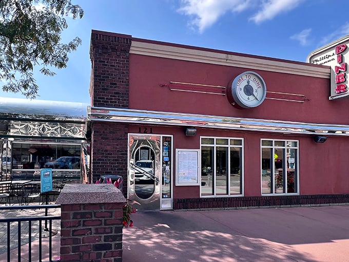 The red facade of Phillips Avenue Diner stands like a time portal to the golden age of American dining, complete with that irresistible retro charm.