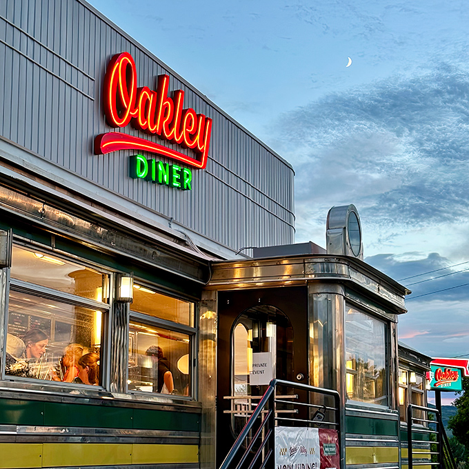 That neon sign against the twilight sky isn't just advertising&mdash;it's a beacon of hope for hungry travelers. Classic Americana at its finest.