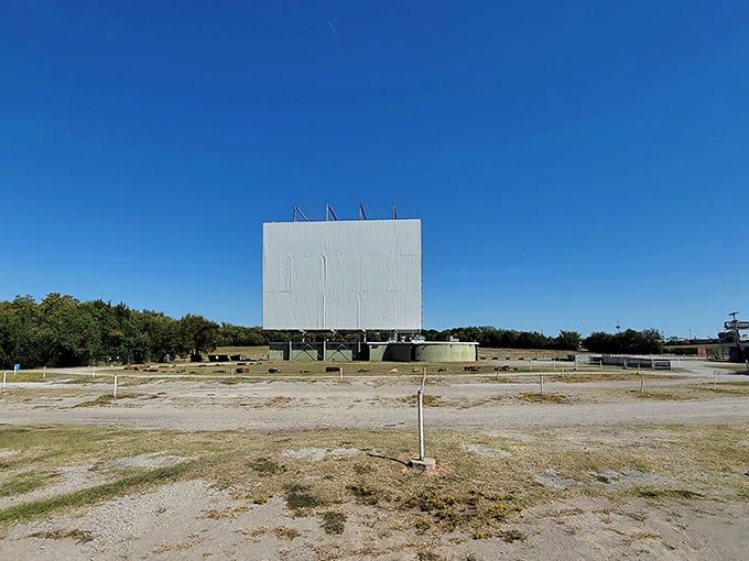 The iconic white screen of the Admiral Twin stands sentinel against the Oklahoma sky, waiting for dusk to transform into a canvas of cinematic dreams.