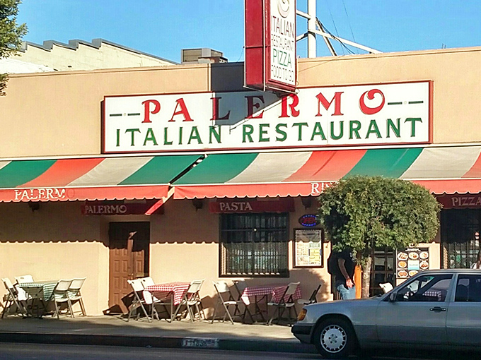The iconic red and green striped awning of Palermo Italian Restaurant stands as a beacon of culinary tradition in Los Feliz, promising pasta perfection within.