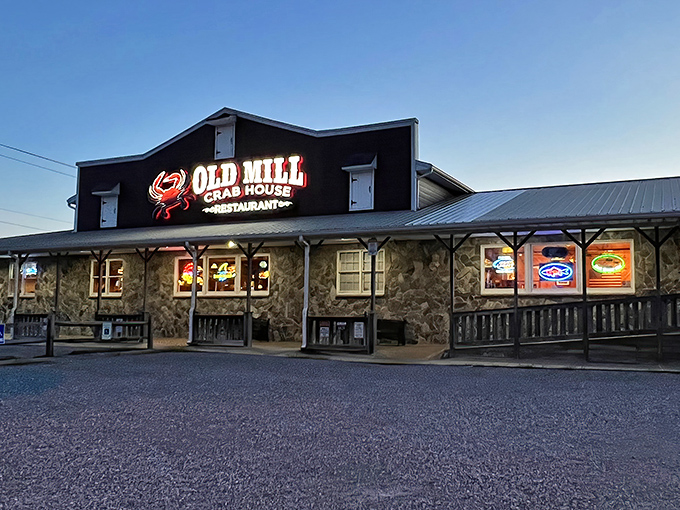 As dusk falls, the Old Mill Crab House glows with promise. Nothing says "seafood sanctuary" quite like a giant illuminated crab.