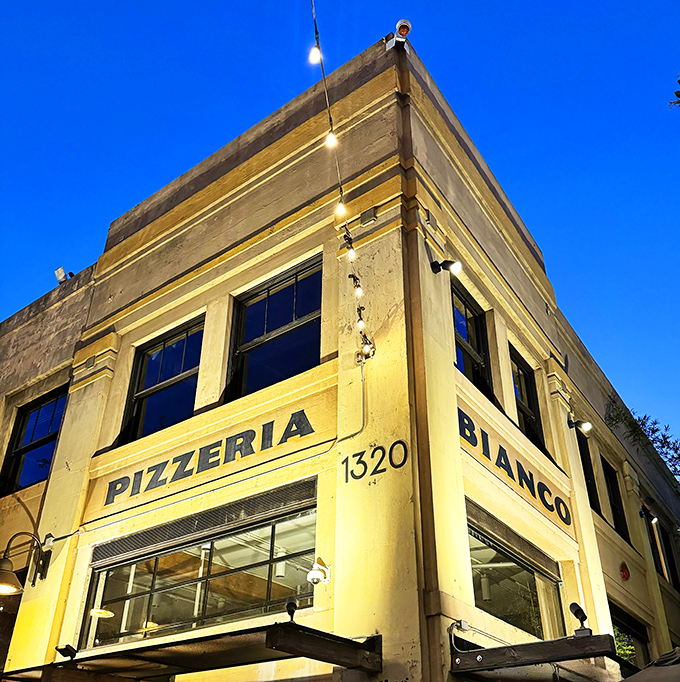 The golden hour glow on this historic DTLA building isn't just pretty lighting&mdash;it's nature's way of saying, "Pizza greatness lives here."