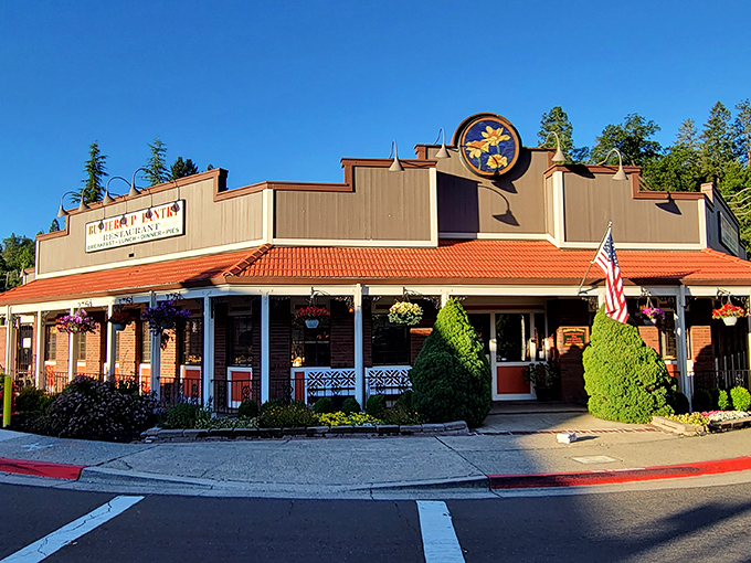 The Buttercup Pantry stands proudly against the California blue sky, its welcoming porch practically whispering, "Come in, the biscuits are waiting."