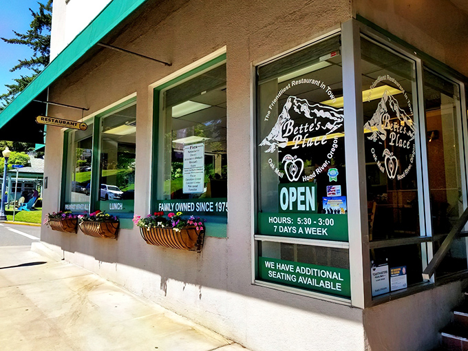 The green awning of Bette's Place beckons like an old friend, promising comfort food treasures within Hood River's charming downtown.