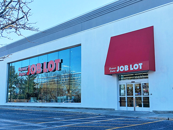 The iconic red signage beckons like a lighthouse for bargain hunters. Inside this unassuming exterior lies a wonderland of unexpected treasures.