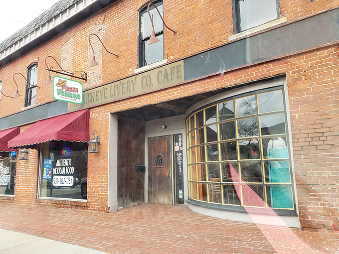 The unassuming sign hanging above "The Buckeye" promises authentic Mexican flavors hiding in plain sight on this Wilmington brick facade.