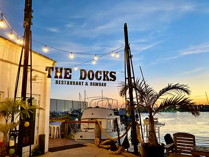 Sunset transforms The Docks into a magical realm where string lights twinkle, boats gently rock, and the day's worries dissolve into the golden horizon.