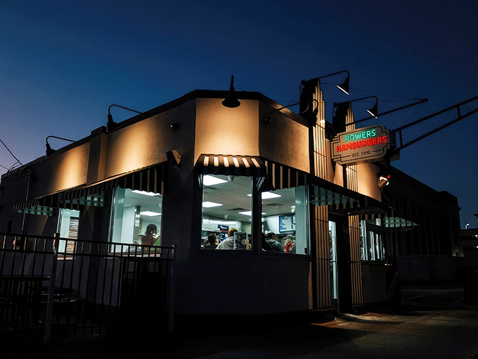 The neon glow of Powers at dusk isn't just a sign&mdash;it's a beacon calling hungry souls home to burger paradise.