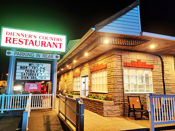 The welcoming facade at night promises the kind of comfort food that makes detours absolutely worthwhile.