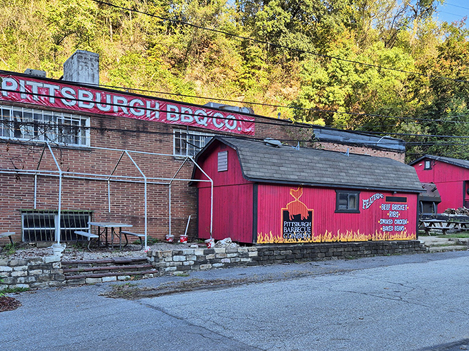 The bright red smokehouse stands out like a beacon of barbecue hope against the Pennsylvania hillside. Flame decorations aren't just for show&mdash;they're a promise.