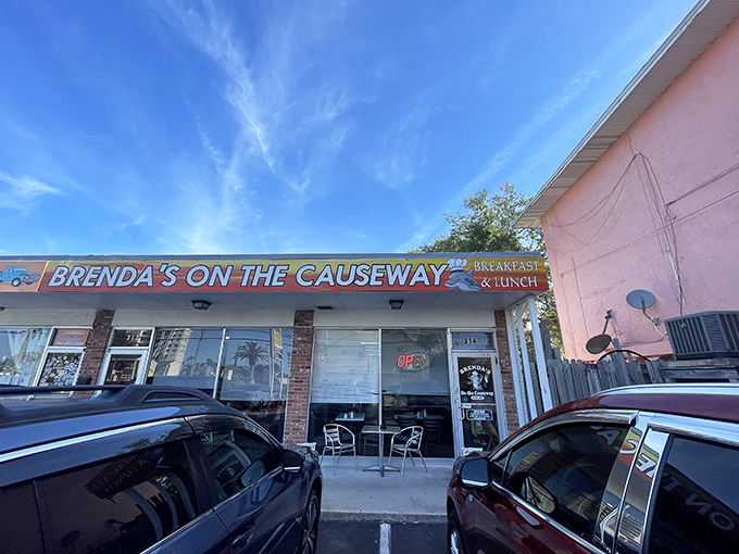 Florida sunshine meets vibrant orange walls at this unassuming strip mall gem. The kind of place where your car automatically turns in.