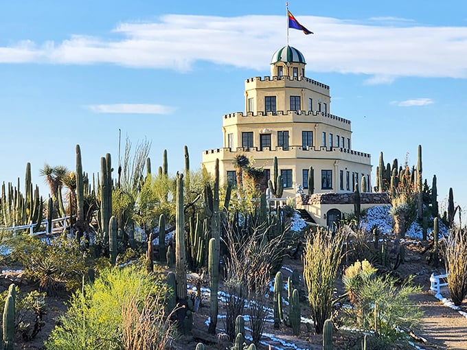 Like a wedding cake dropped in the desert, Tovrea Castle rises majestically above a sea of cacti, its cream-colored tiers defying the harsh landscape.