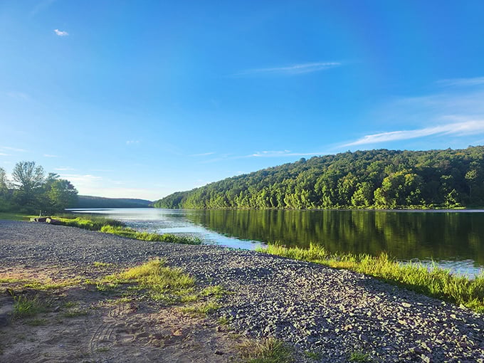 Morning perfection at Prompton Lake, where the water mirrors the forested hills like nature's own Instagram filter. Pennsylvania serenity at its finest.