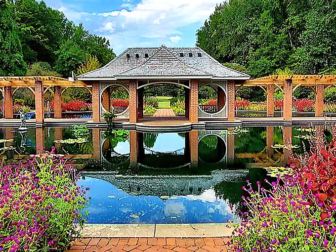 A serene pond reflects the sky like nature's mirror, while vibrant flowers create a colorful border that would make any stress melt away faster than ice cream in August.