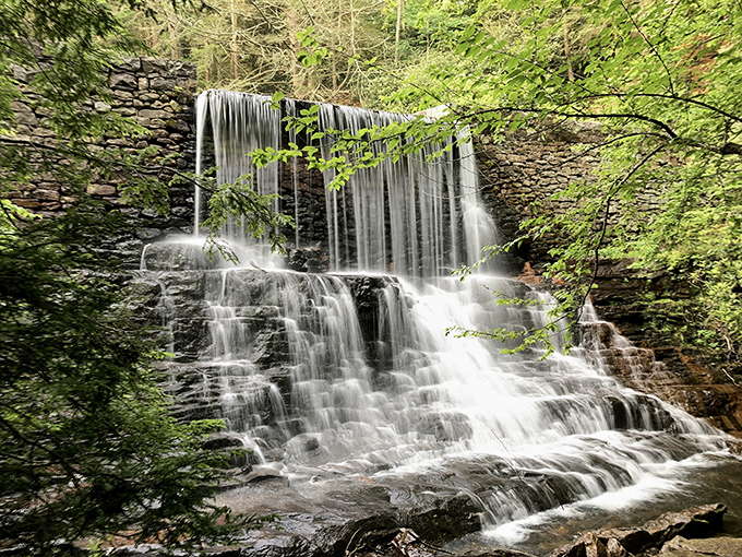 Nature's architectural masterpiece on display. This multi-tiered waterfall creates a symphony of sound that makes smartphone notifications seem utterly insignificant.
