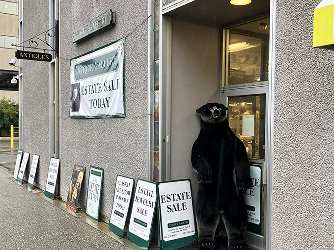 The unassuming entrance to The Antique Gallery, complete with a bear guardian who's been checking IDs since the gold rush days.