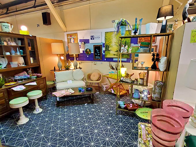 A mid-century modern lover's dream booth, showcasing vintage furniture, lamps, and decor that would transform any contemporary space.