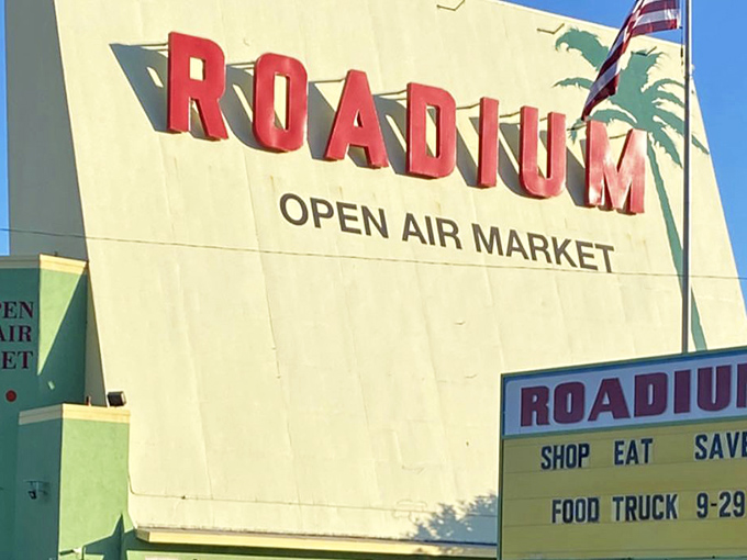The iconic red letters of The Roadium sign promise adventure for treasure hunters. Southern California's legendary open-air market awaits!