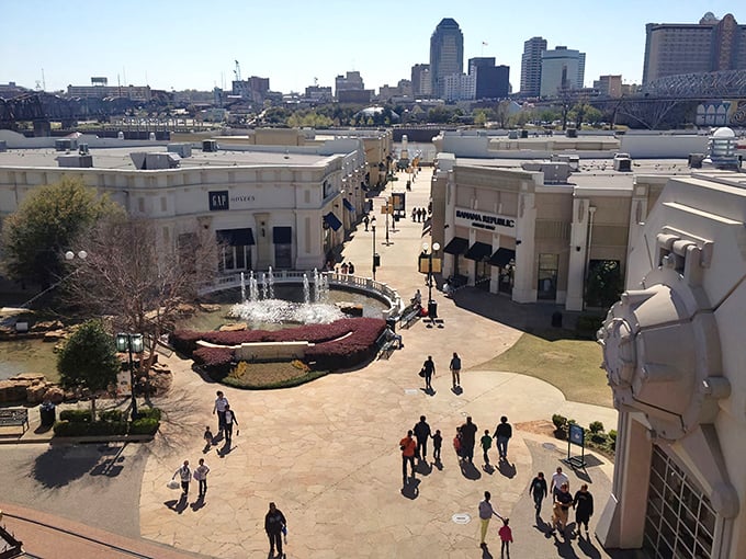 Aerial views reveal the boardwalk's masterplan: trap shoppers between river views and outlet deals with nowhere to escape except more stores.