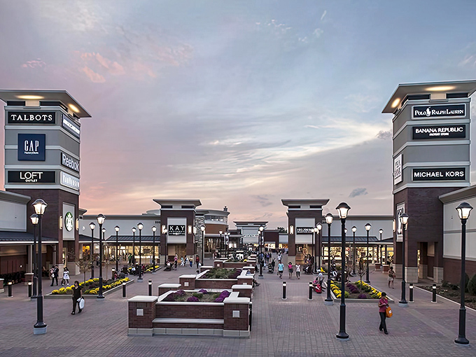 The grand entrance to Twin Cities Premium Outlets beckons shoppers with its clean design and promise of retail therapy at prices that won't require a second mortgage.