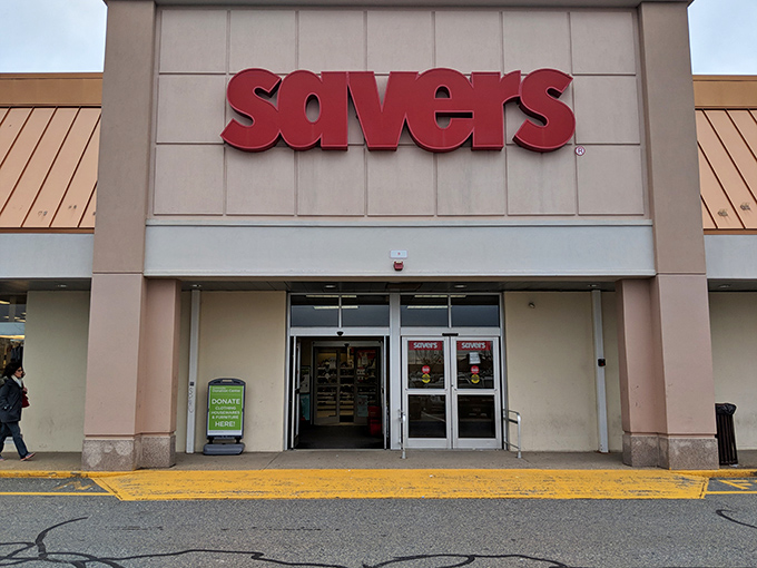 The iconic red Savers sign beckons like a lighthouse for bargain hunters. Treasure awaits behind those unassuming doors!