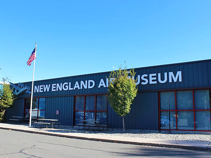 The unassuming blue exterior of the New England Air Museum belies the aviation wonderland waiting inside. Like finding a five-star restaurant in a strip mall.