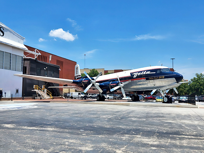 The gleaming DC-3 sits proudly outside the museum, a silver time machine ready to transport you back to aviation's golden age.