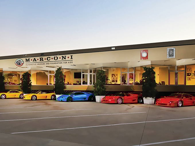 Ferrari red dominates the exterior lineup at Marconi Automotive Museum, where supercars greet you like celebrities at a Hollywood premiere.