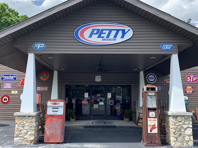 The entrance to racing royalty! Vintage gas pumps and classic automotive signs welcome you to the Richard Petty Museum in Randleman.
