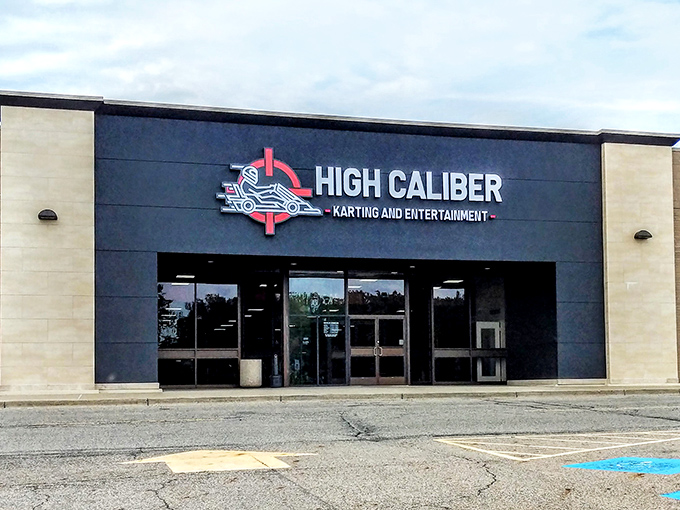 The checkered flag beckons at High Caliber Karting's entrance, promising speed demons a playground where childhood racing dreams come true.