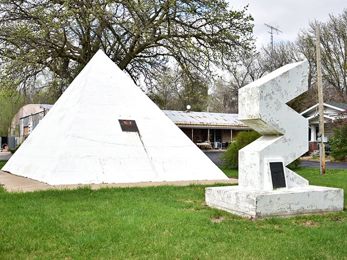 The pyramid and its zigzag companion stand like monuments to America's endearing obsession with preserving everything, including cars.