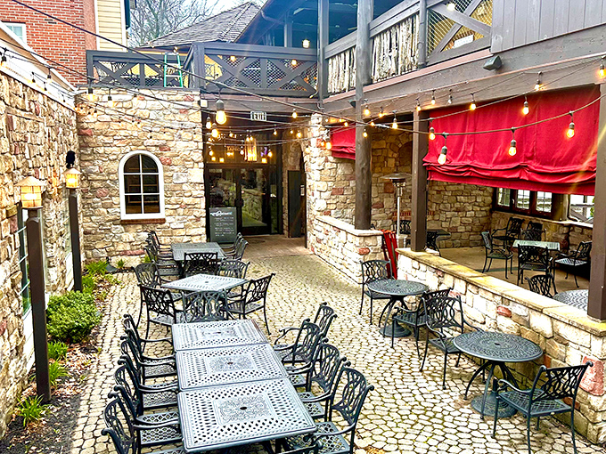 Step into Sherwood Forest reimagined! The cobblestone courtyard and stone walls transport you to medieval England, while string lights add modern magic.