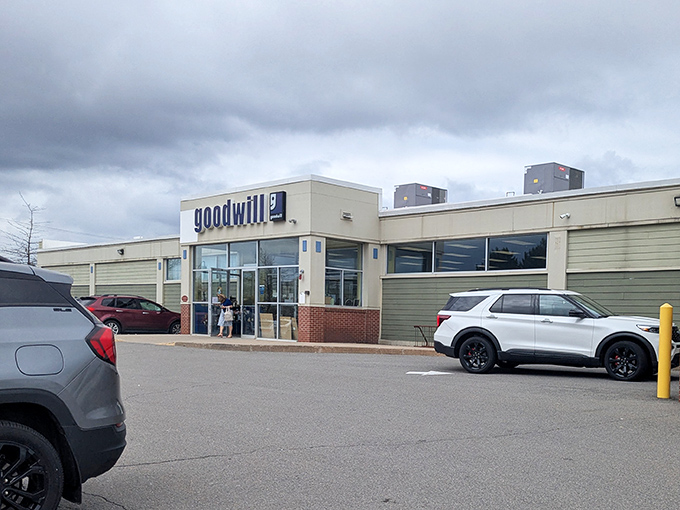 The unassuming exterior of Manchester's Goodwill hides a treasure trove within, like a plain clam shell concealing a perfect pearl.