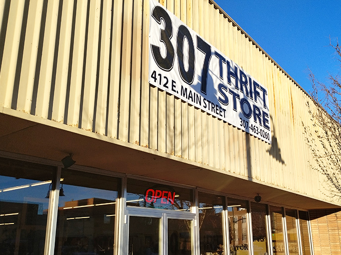 The tan exterior of 307 Thrift beckons with its bold signage &ndash; a humble facade hiding a treasure trove of possibilities within.