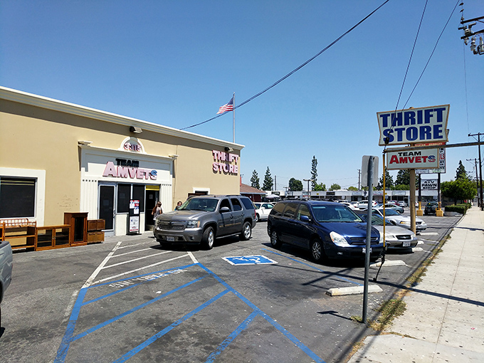The unassuming exterior of AMVETS Thrift Store in Long Beach &ndash; where treasure hunting adventures begin beneath the California sun.