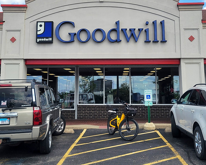 The iconic blue Goodwill sign beckons like a lighthouse for bargain hunters. This Arlington Heights location has saved countless Illinois closets from fashion emergencies.